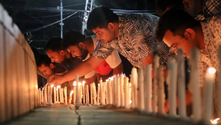 Protesters hold candlelight vigil, demand justice for Shammo's murder