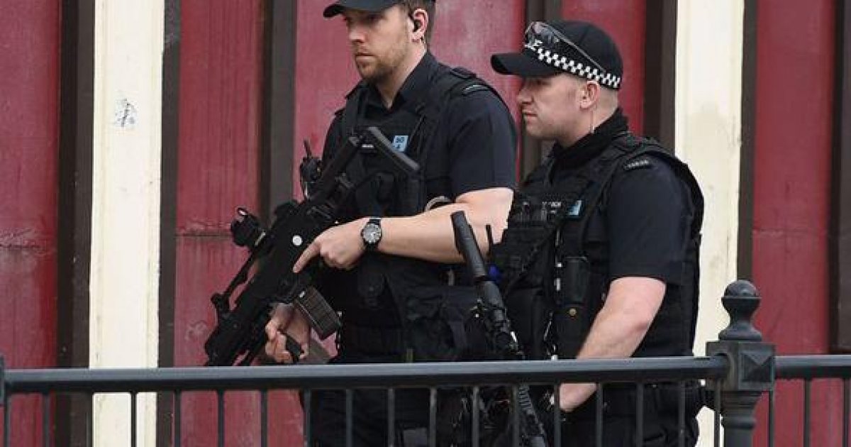 Armed police carry out fresh raid in Manchester amid report of explosion