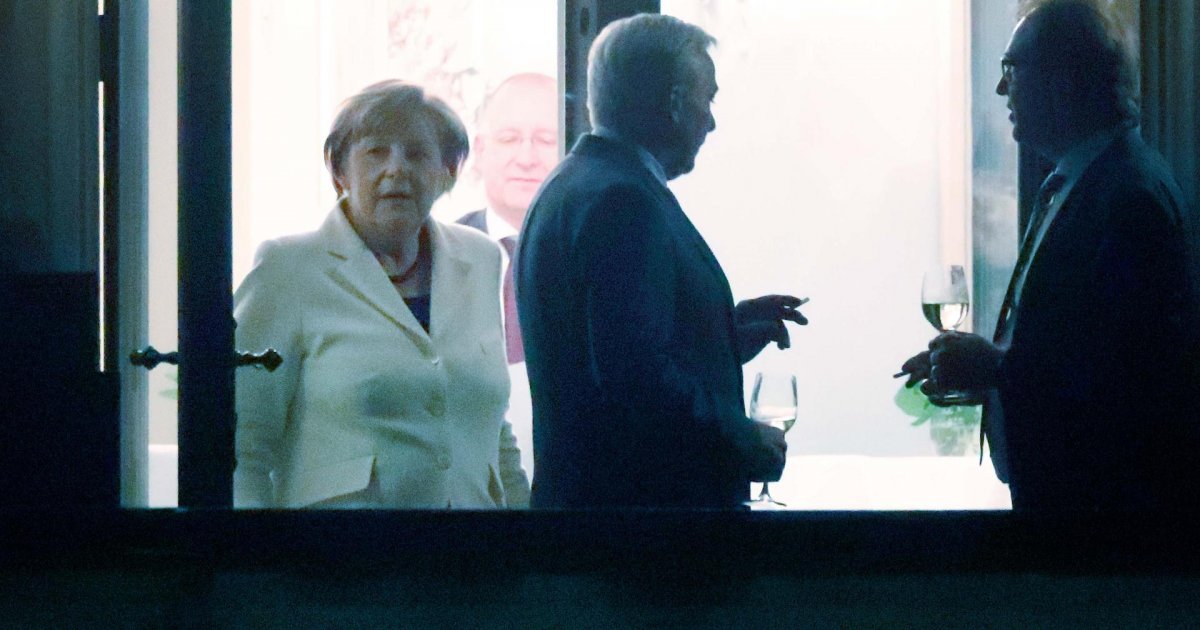 Matchmaker Merkel seeks awkward three-way embrace