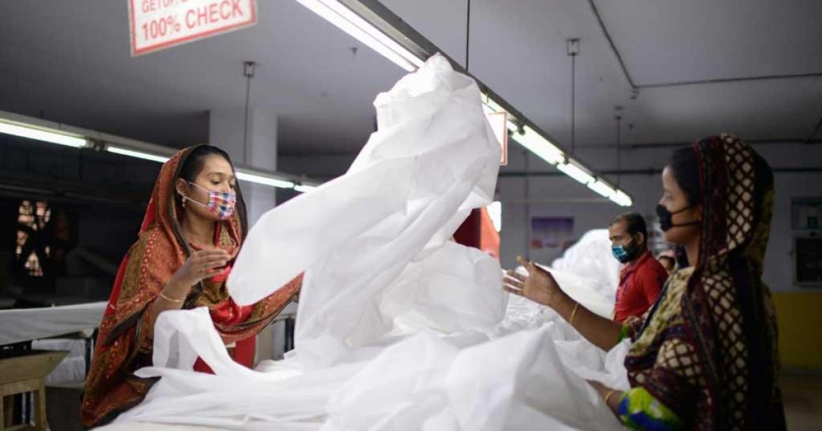 In pictures: PPE production at a garment factory