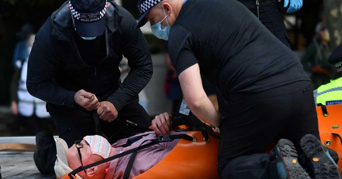 UK charges 26 over printing works climate protest