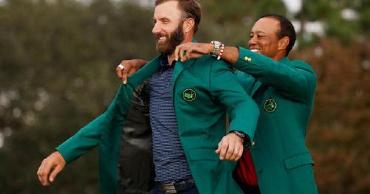 Emotional Johnson wins Masters