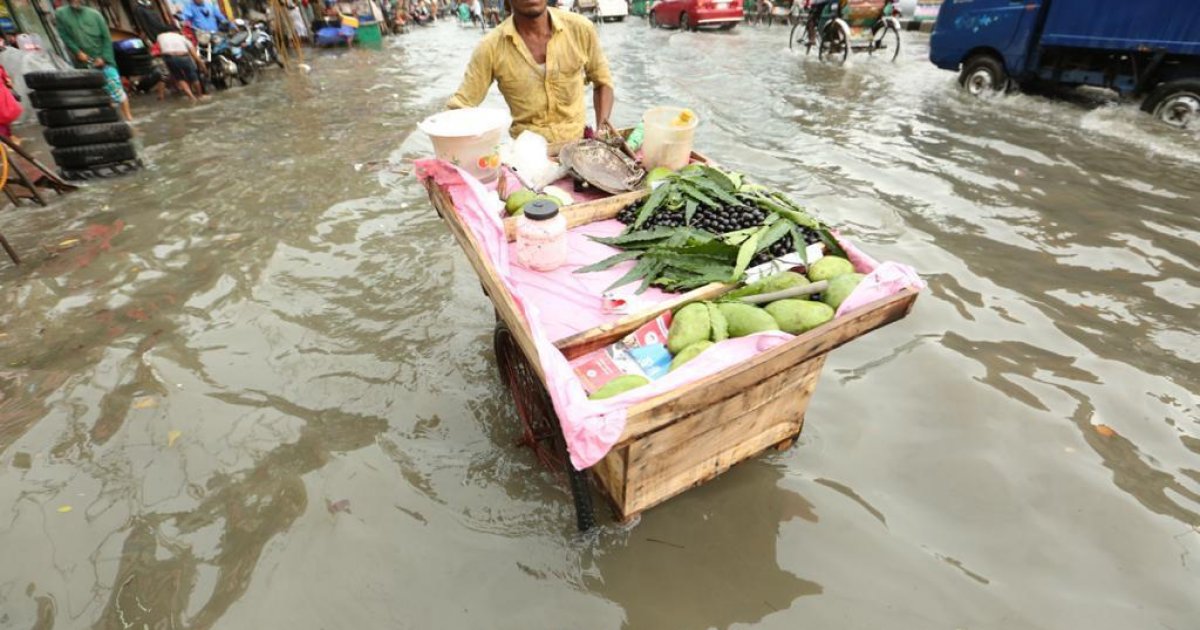 In pictures: Rain brings relief to city dwellers, but hinders movement