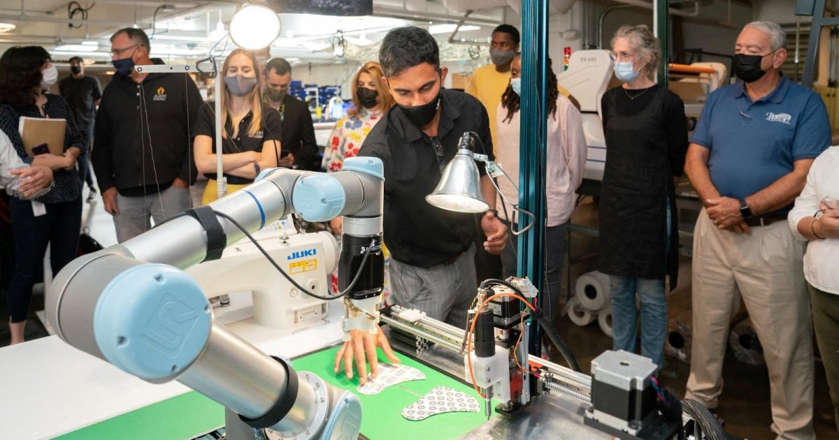 Robots set their sights on a new job: sewing blue jeans