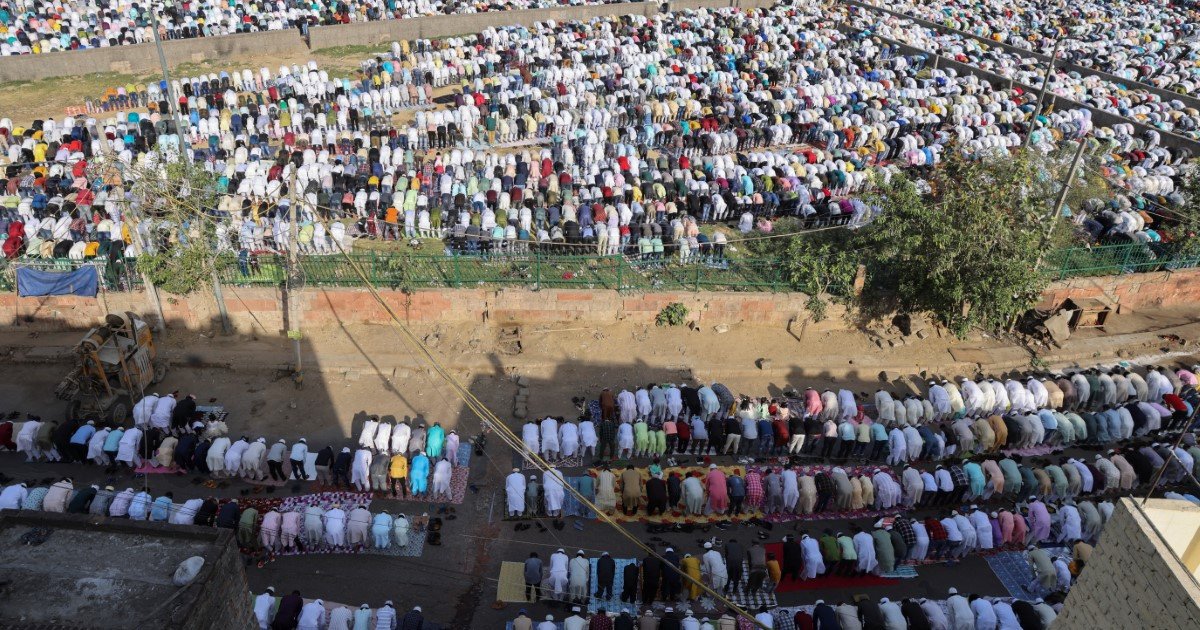 In pictures: Muslims across world celebrate Eid with prayers