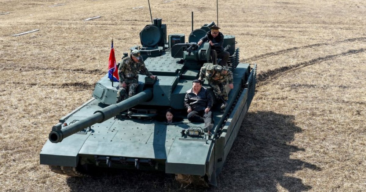 North Korean leader, daughter try out new tank