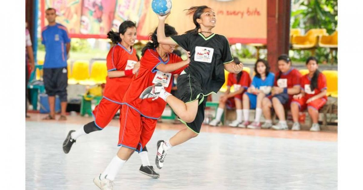 School handball rolls into semis