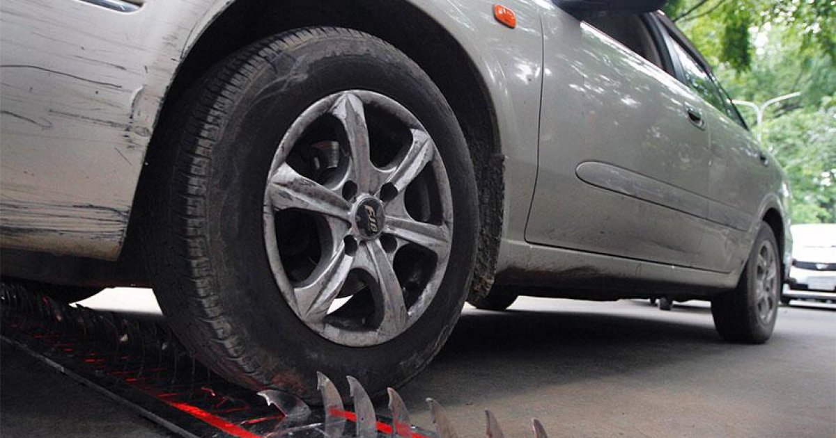 Retractable spikes on city roads to stop reverse traffic