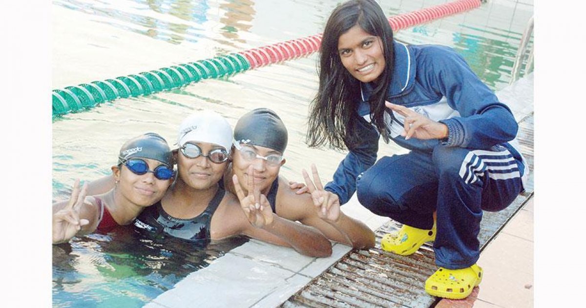 Seven new records in National Swimming