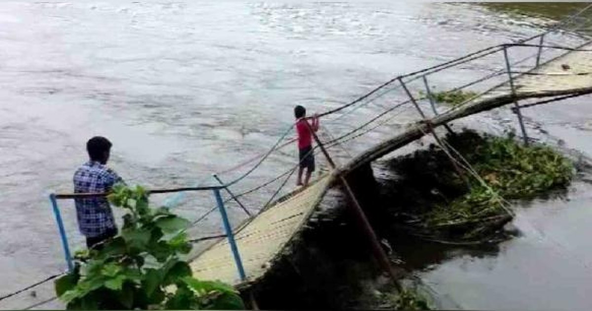 Wooden bridge over Chawai River, the only resort for 10,000 people ...