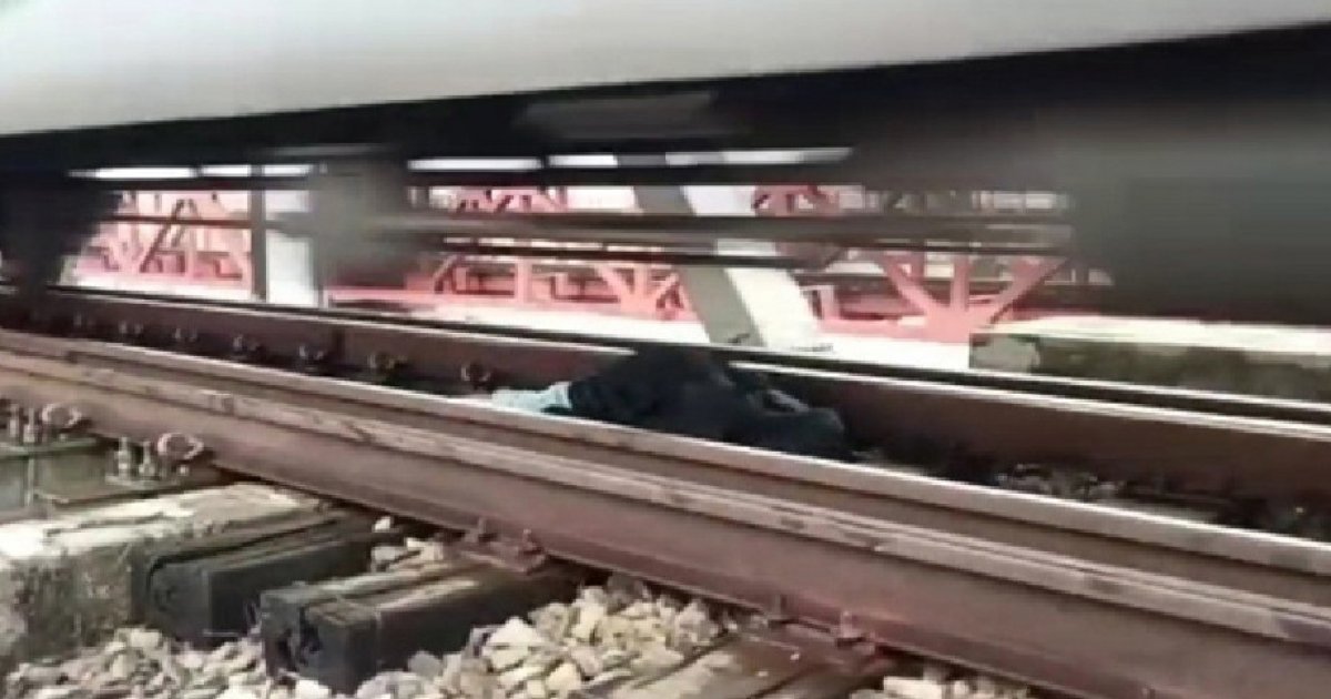 Teen under train survives after getting stuck on railway track