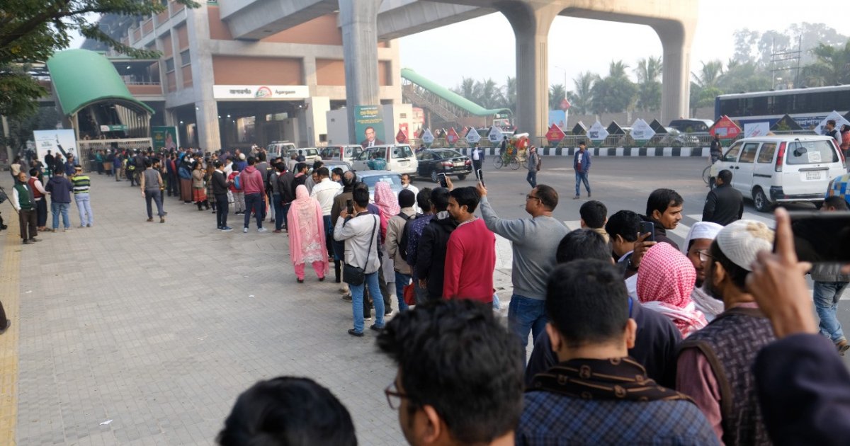 Dhaka residents wait in long queues to ride metro rail for first time