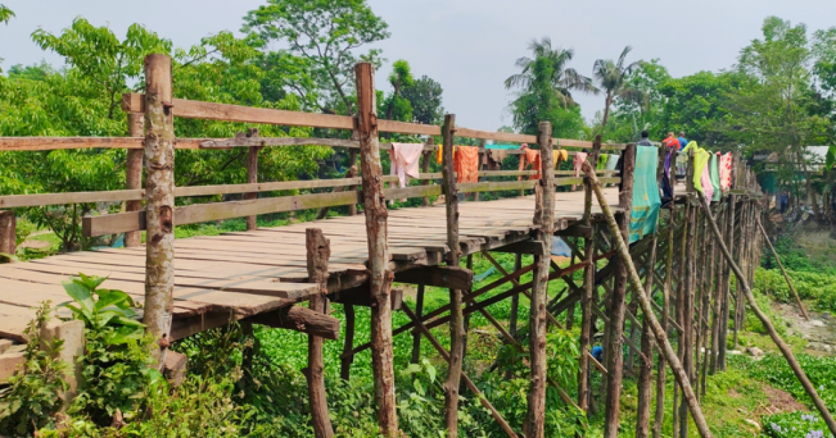 Risky wooden bridge only means for thousands of villagers
