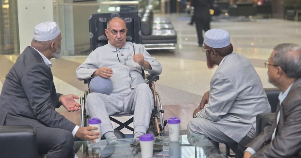 Jamaat secretary general visits ailing Mirza Abbas in Malaysia