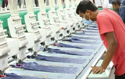 In pictures: RMG production continues with strict health protocols