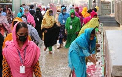 In pictures: RMG production continues with strict health protocols