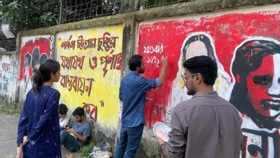 DU students restore defaced graffiti of Begum Rokeya